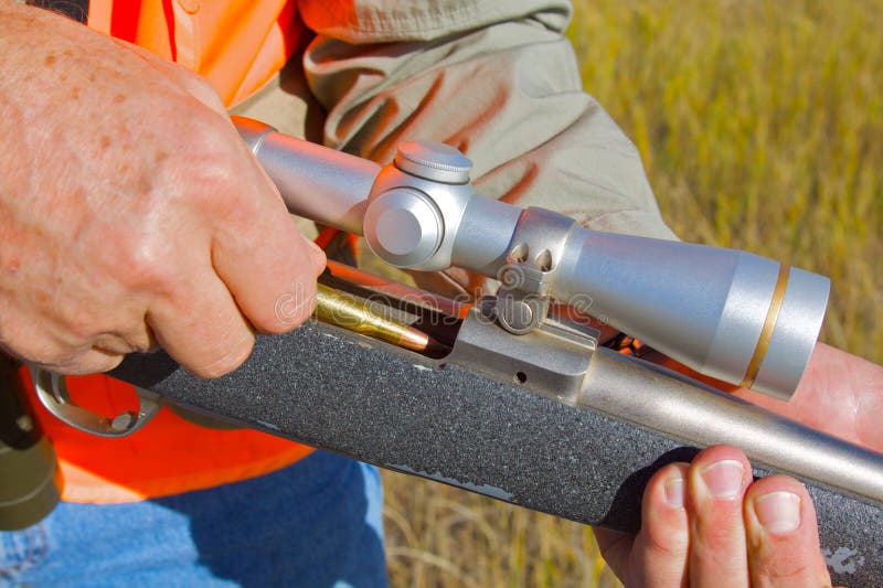Hunter Loading Rifle stock image. Image of hunt, outdoors - 11329553