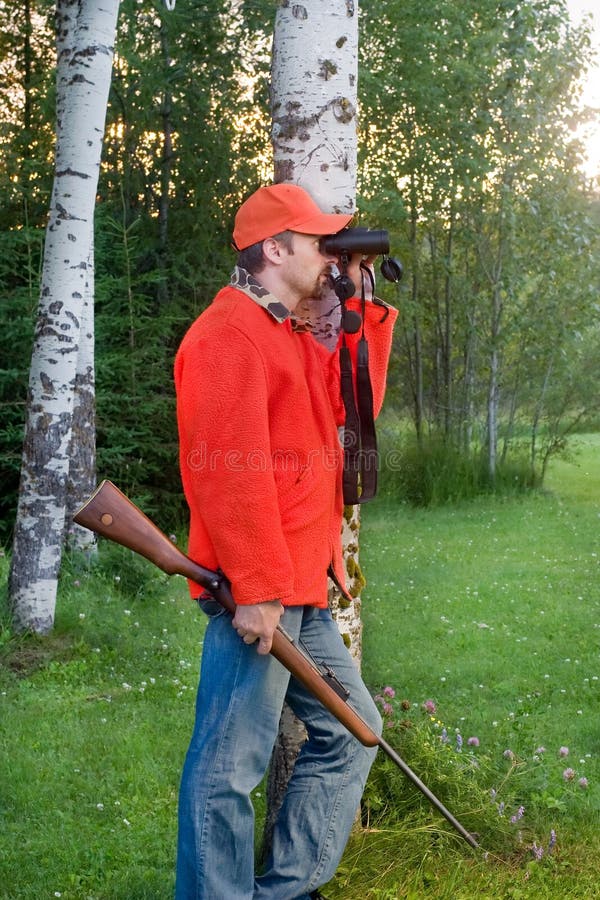 Hunter Looking through Binoculars Stock Photo - Image of orange, season ...