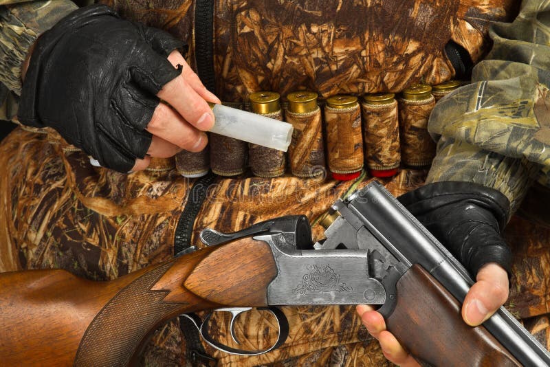 Hunter Pulls Out a Shell Casing from a Shotgun Stock Image - Image of ...