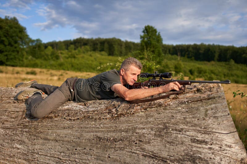 Hunter with rifle stock image. Image of wood, gamekeeper - 155349409