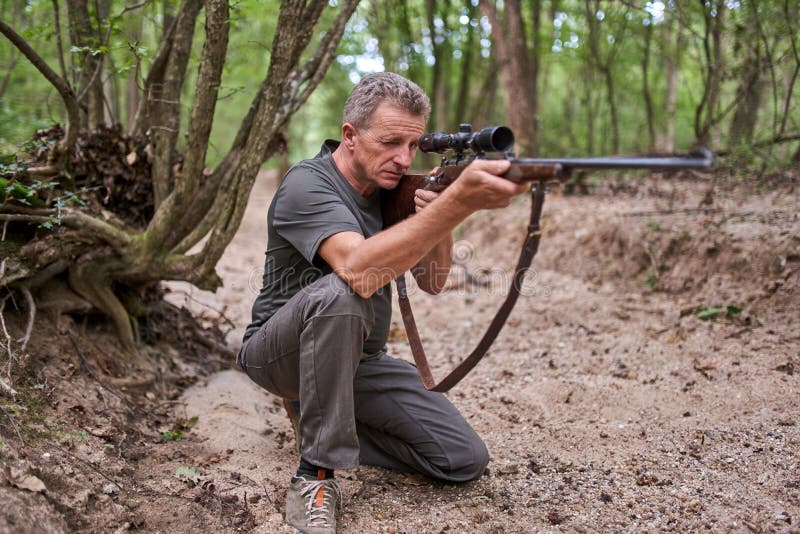 Hunter with rifle stock image. Image of season, occupation - 155349395