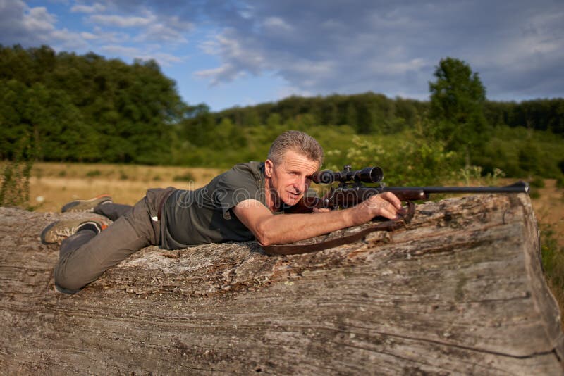 Hunter with rifle stock image. Image of woods, wildlife - 155349431