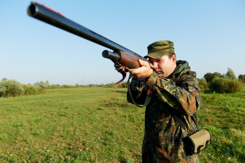 Hunter with rifle gun stock image. Image of camo, aiming - 20954441
