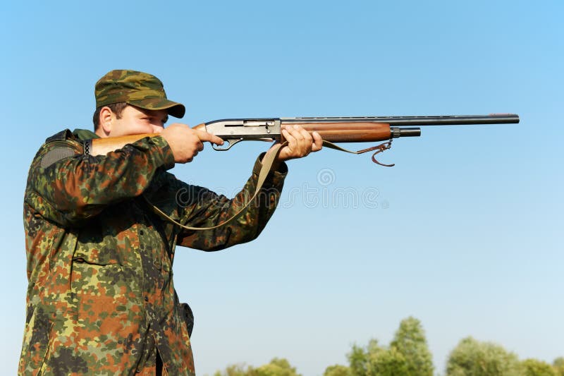 Hunter with rifle gun stock photo. Image of season, hobby - 21629078