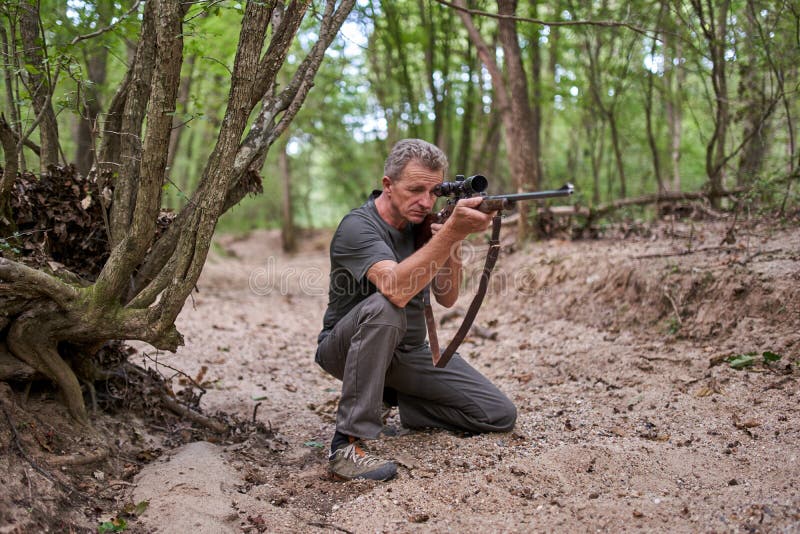 Hunter with rifle stock image. Image of hunter, recreation - 155349343