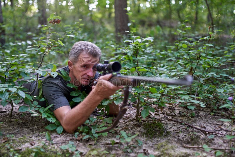 Hunter with rifle gun stock photo. Image of season, hobby - 21629078