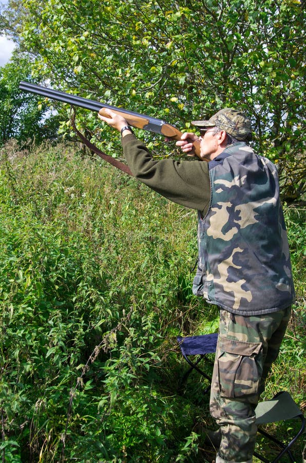 Hunter Shooting a Hunting Gun Stock Image - Image of male, hunting ...