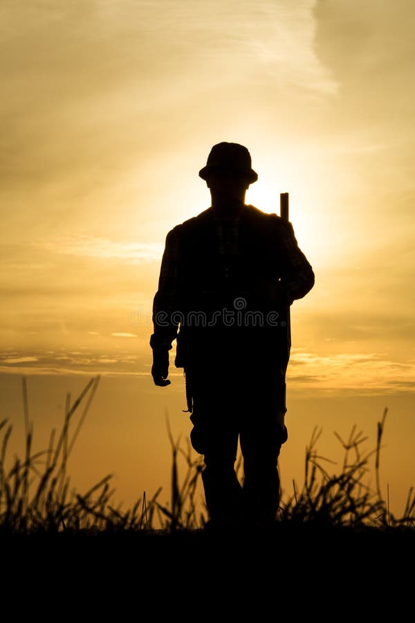 Hunter Shooting in Sunset stock photo. Image of hunt - 18696766