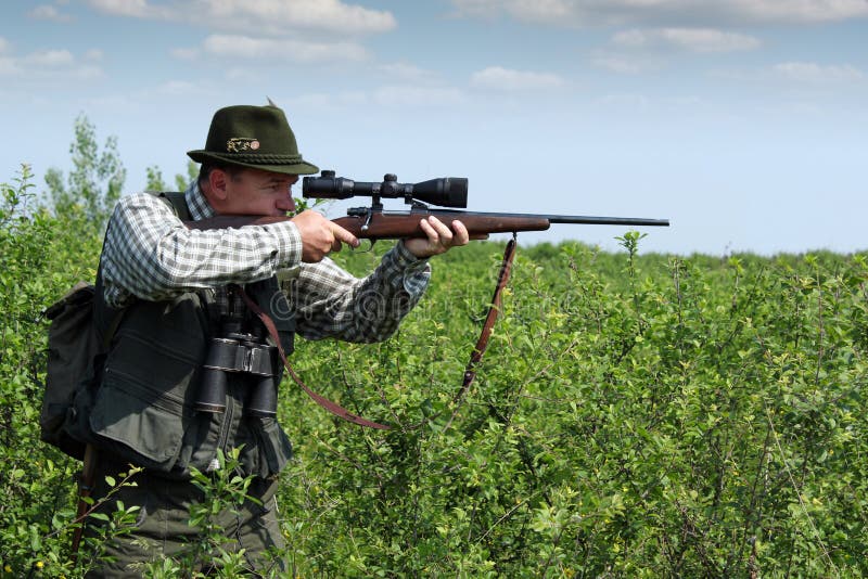 Hunter with sniper rifle stock photo. Image of male, activity - 28822028