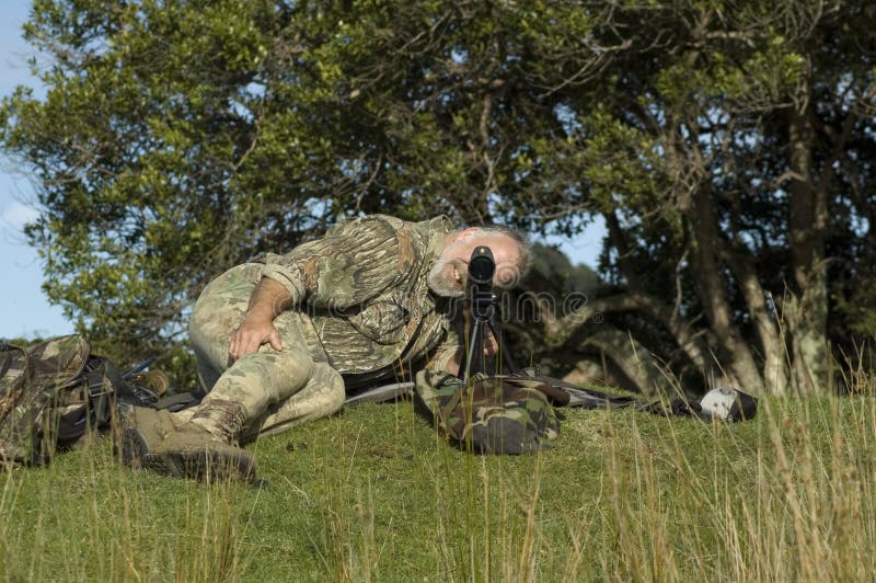 Hunter with spotting scope stock image. Image of searching - 3725459