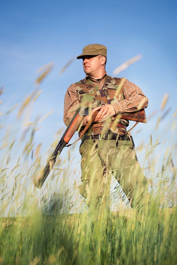 Hunter wild duck hunting stock image. Image of portrait - 54103465