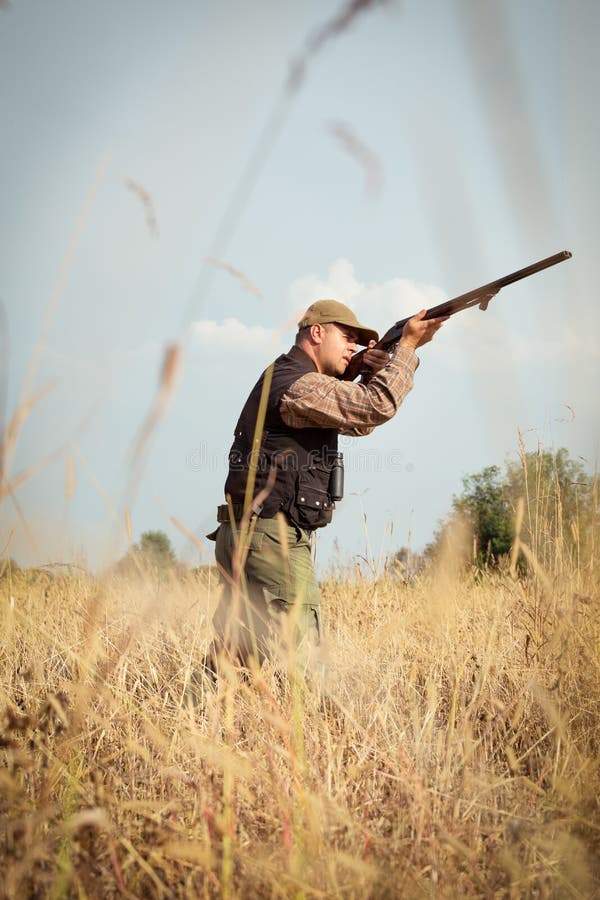Hunter wild duck hunting stock image. Image of male, discovery - 77240311