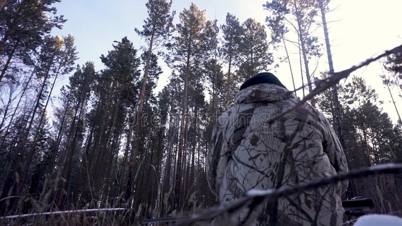 Hunters in the Woods. Armed Rangers in Winter Forest Stock Video ...