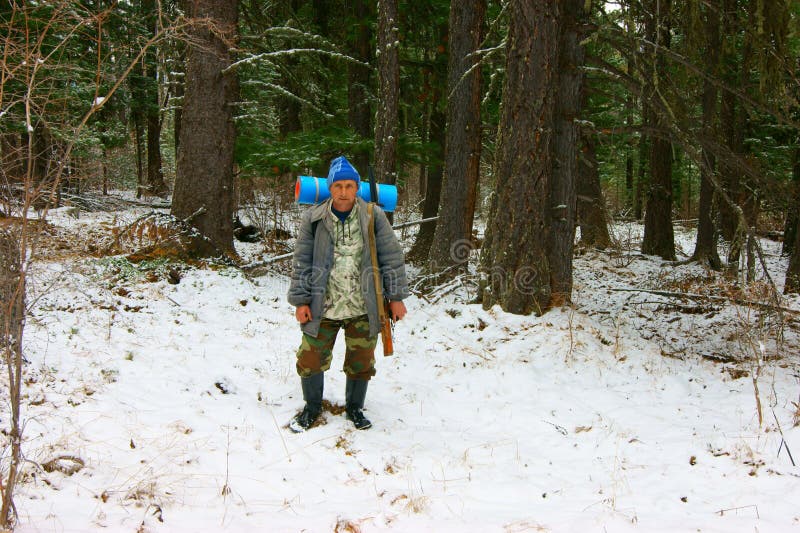 Huntsman in wood in winter stock photo. Image of recreational - 30832244