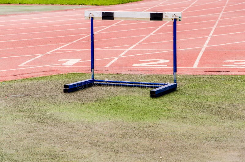 Hurdle on Athletic track stock photo. Image of jogging - 41211056