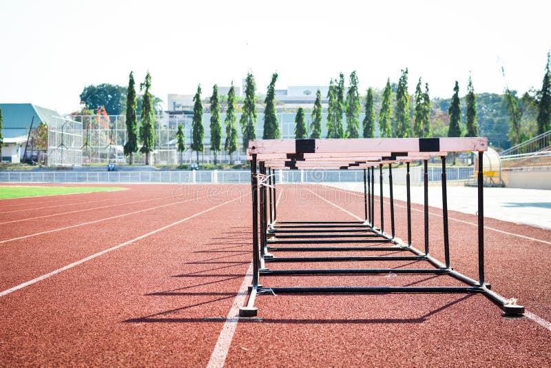 Hurdle Race on Stadium Track Stock Photo - Image of contest, challenge ...