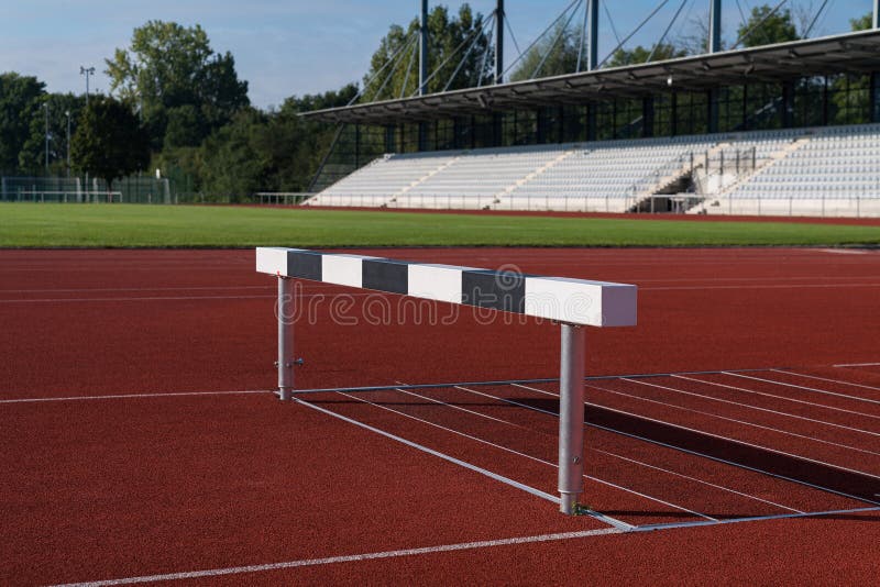 Hurdle on a Red Athletic Track at a Training Facility during Daylight ...