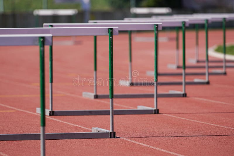 Hurdles on a Athletics Track Stock Image - Image of stepping, sporty ...