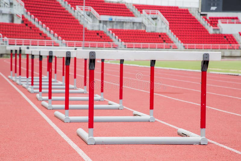 Hurdles on the Red Running Track Stock Image - Image of lanes, contest ...