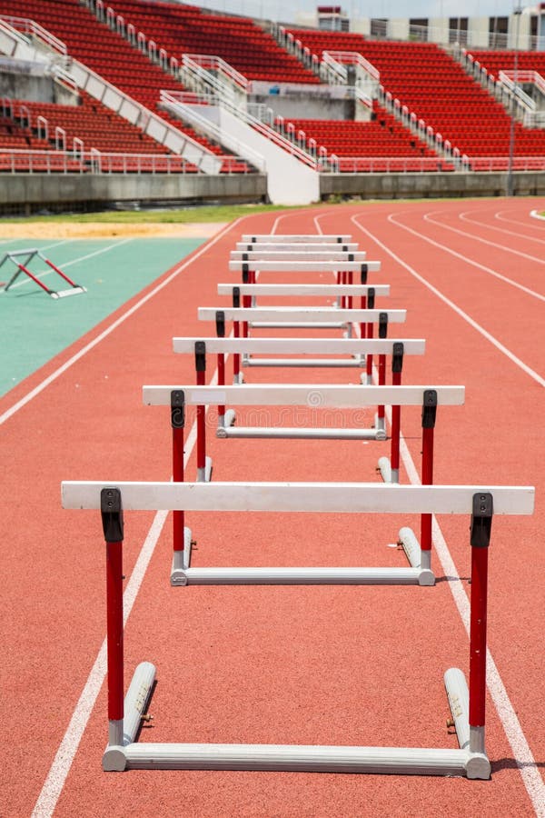 Hurdles on the Red Running Track Prepared Stock Photo - Image of sport ...