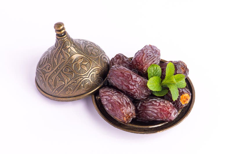 HURMA, Dates. Dried Dates Fruit with Bronze Bowls on White Background ...