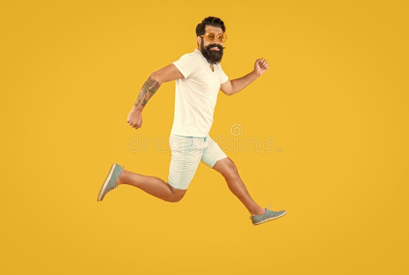 Hurrying Man Isolated on Yellow. Hurrying Man in Studio. Hurrying Man ...