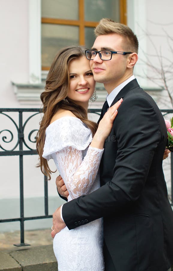 The Husband and the Bride Hug Each Other Stock Photo - Image of ...