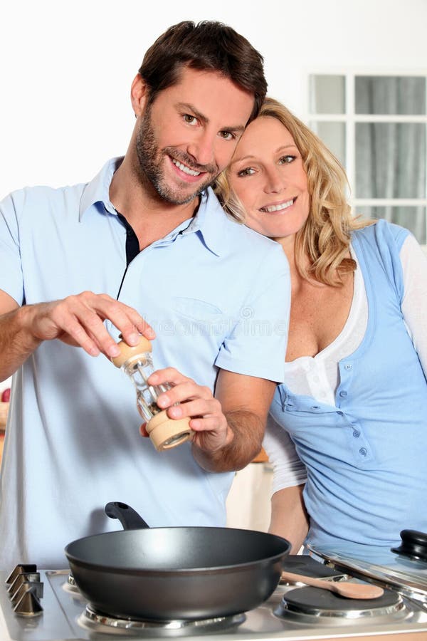 Husband cooking for wife stock photo. Image of view, husband - 22630476