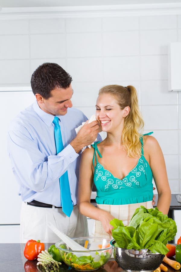 Husband helping wife stock photo. Image of fresh, color - 12836426
