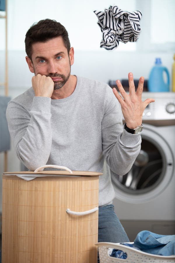 Husband during daily Duties Stock Photo - Image of press, cloth: 309079202