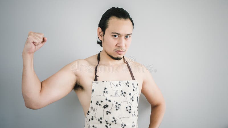 Husband ready to cook. stock image. Image of apron, couple - 71109795