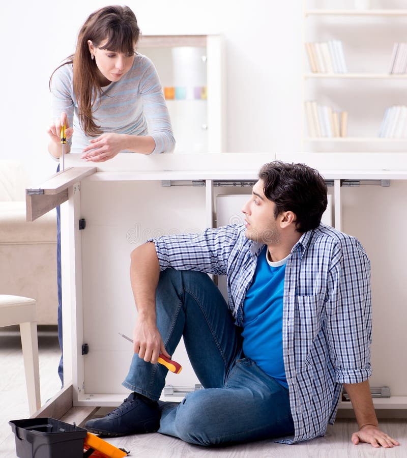 Husband Repairing Broken Table at Home Stock Image - Image of furniture ...