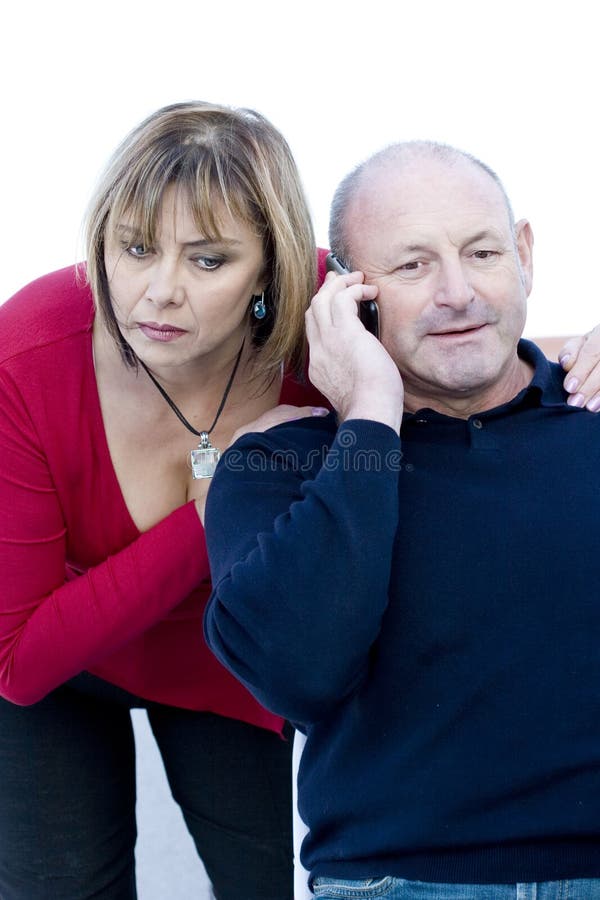 Husband Talking on the Phone and Wife is Listening Stock Image - Image ...
