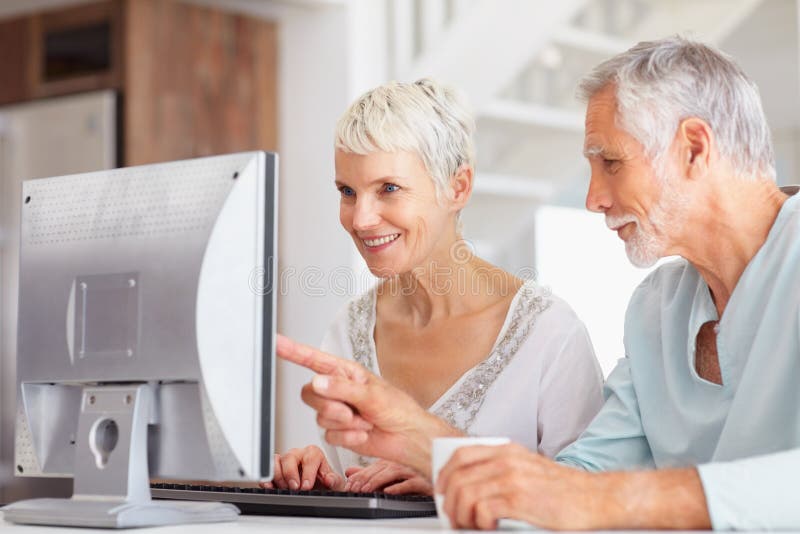 Husband Teaching Wife How To Use Computer Stock Photo - Image of ...