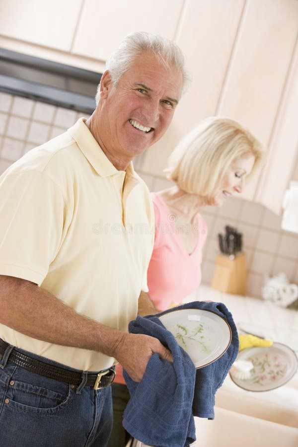 Husband and Wife Cleaning Dishes Stock Photo - Image of kitchen, couple ...