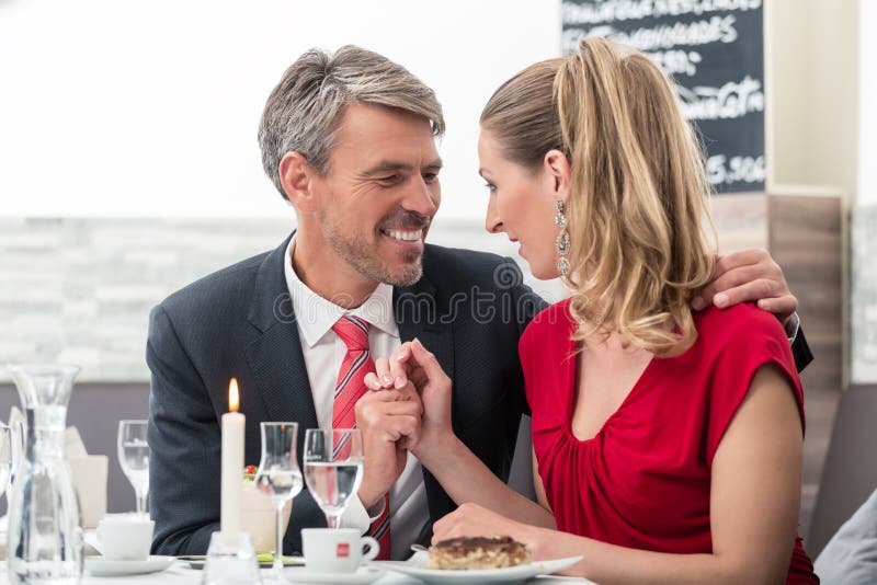 Husband and Wife Sharing a Relaxing Breakfast Stock Photo - Image of ...