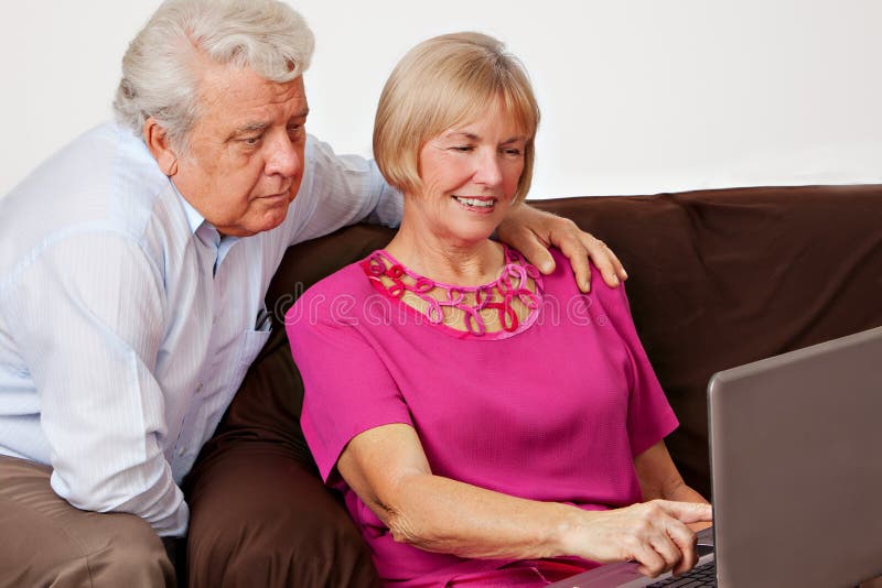 Husband and Wife Work on Computer Stock Image - Image of sitting ...