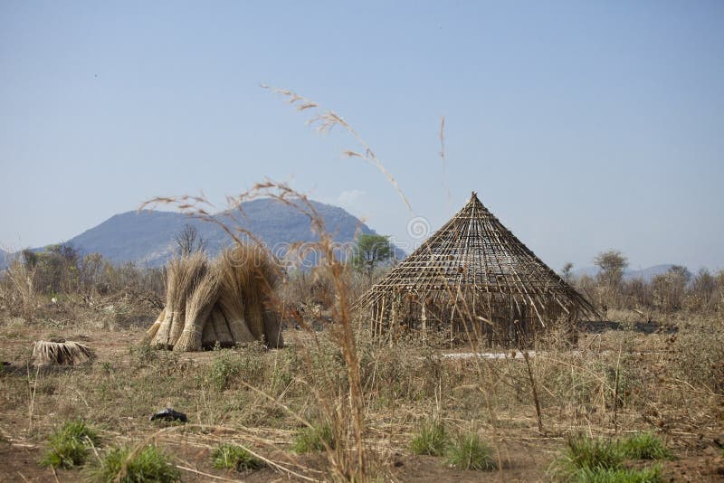 Hut Being Built in South Sudan Stock Photo - Image of pedestrian ...