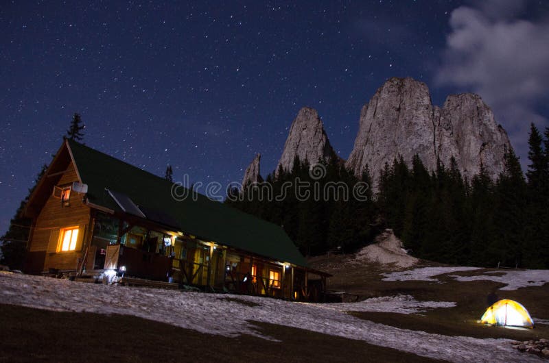 Hut and cliffs at night stock image. Image of snow, beautiful - 75208891