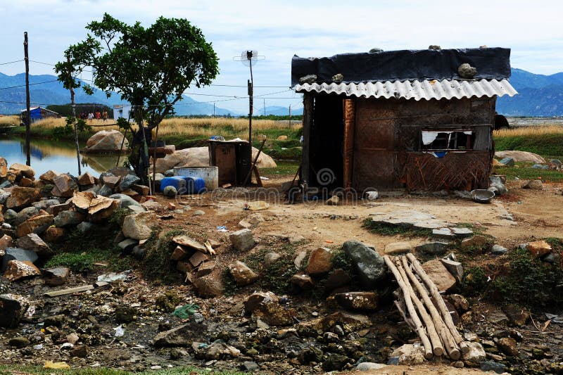 Hut on the dry stream bank stock photo. Image of bank - 163814730