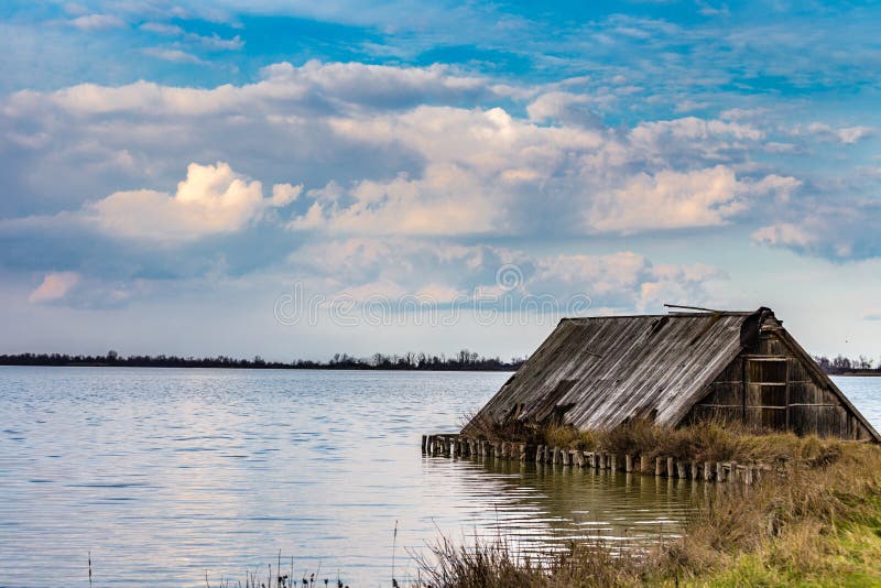 Hut in lagoon stock photo. Image of thatched, panorama - 109984134