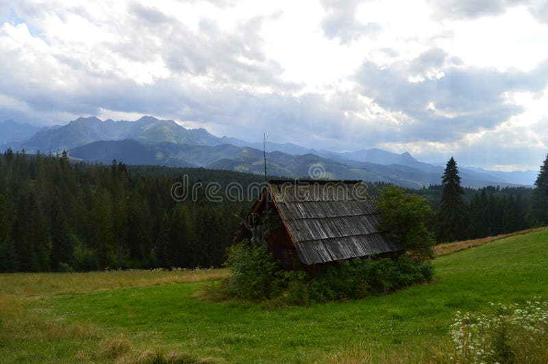 Hut in the mountains stock photo. Image of charming, forest - 58249596