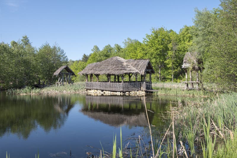 Hut on stilts on the water stock image. Image of lake - 120162921