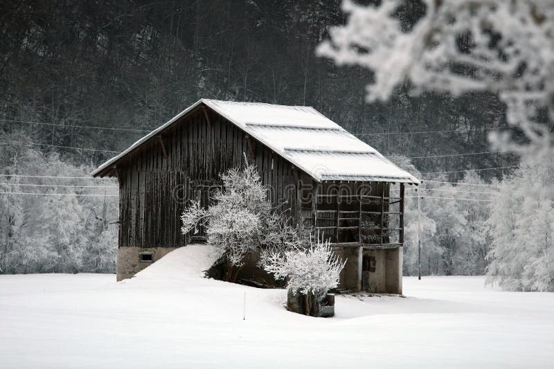Hut in a snowy scenery stock image. Image of brown, rural - 12181607
