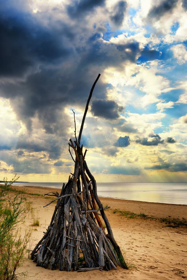 Hut of Sticks on the Sea Beach Stock Image - Image of coast, plant ...