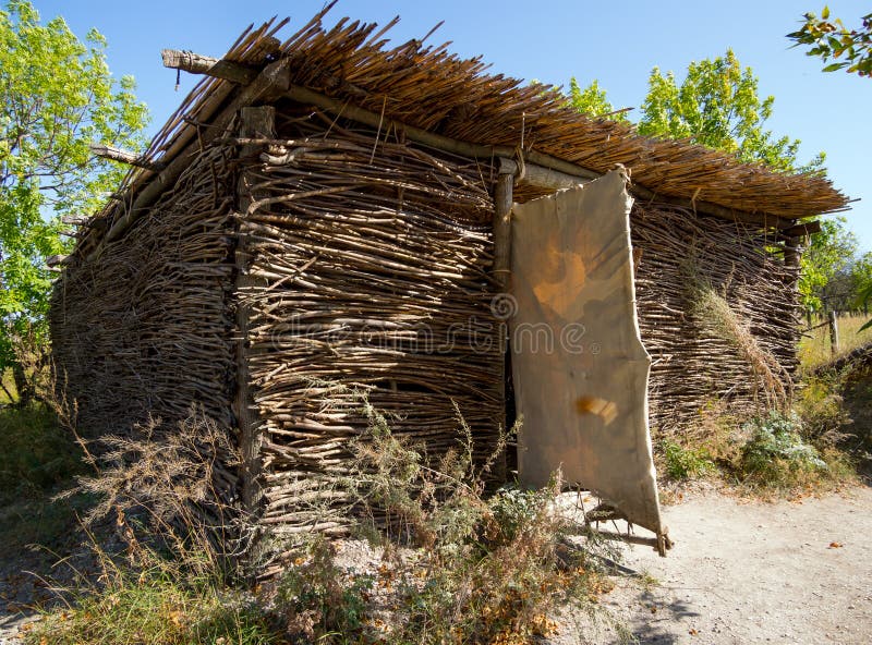 A Hut with Walls of Interlaced Twigs, Covered with Reeds Stock Photo ...