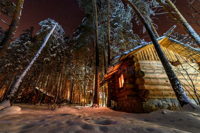 Hut on a winter night. stock photo. Image of light, frost - 167449448