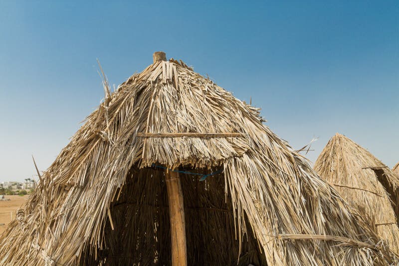 Huts of dried leaves stock photo. Image of straw, tourism - 77567098
