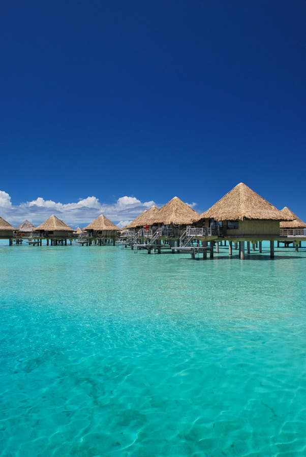 Huts on the water stock photo. Image of bungalow, turquoise - 14063918