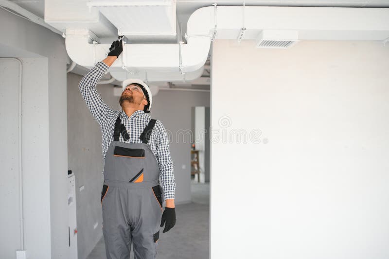 Hvac Services Indian Worker Install Ducted Pipe System for Ventilation ...